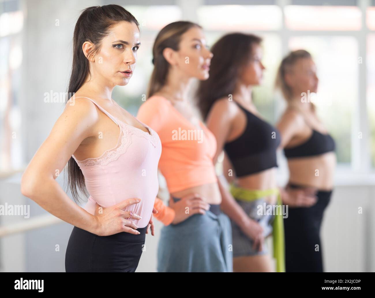 Group of women in high heels dance in line Stock Photo - Alamy