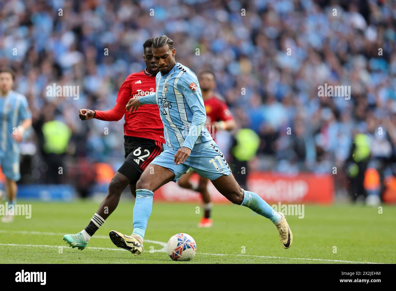 London, UK. 21st Apr, 2024. Haji Wright of Coventry city & Omari Forson ...