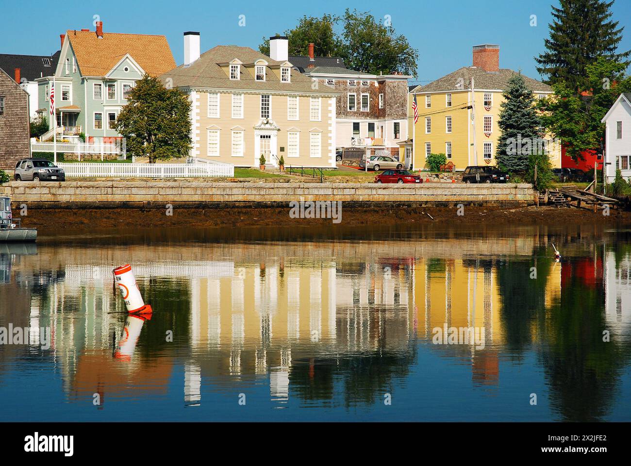Historic colonial homes of Portsmouth, New Hampshire are reflected in ...