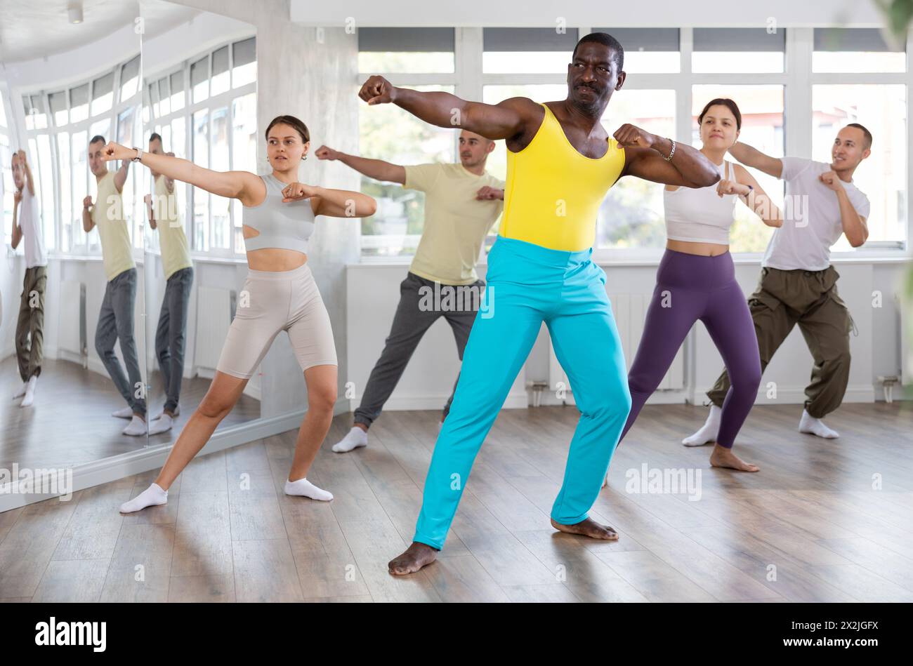 Group of people dancing modern dances Stock Photo - Alamy