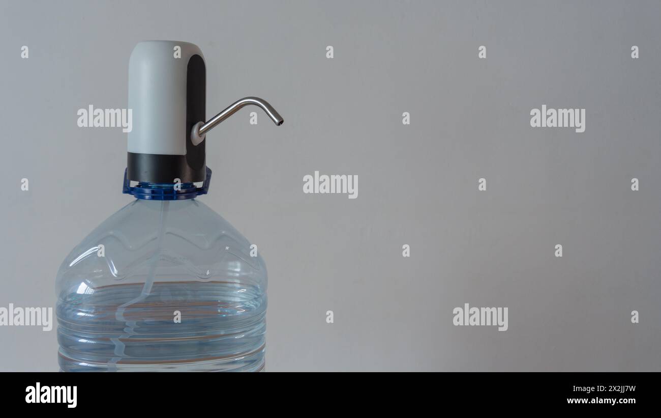Manual water dispenser, pure and simple Stock Photo - Alamy