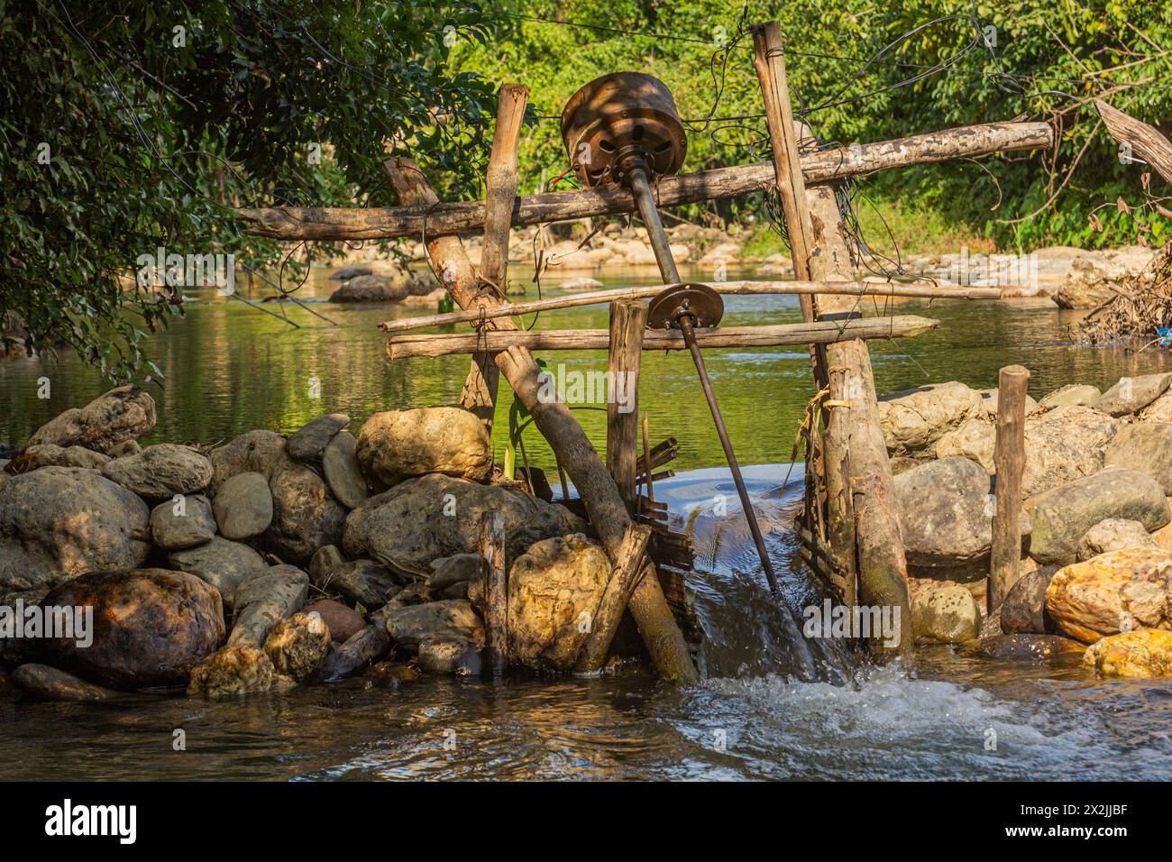 Small hydro electric generator in Ban Na village near Muang Ngoi Neua ...