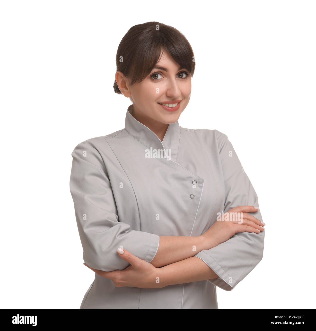 Cosmetologist in medical uniform on white background Stock Photo - Alamy