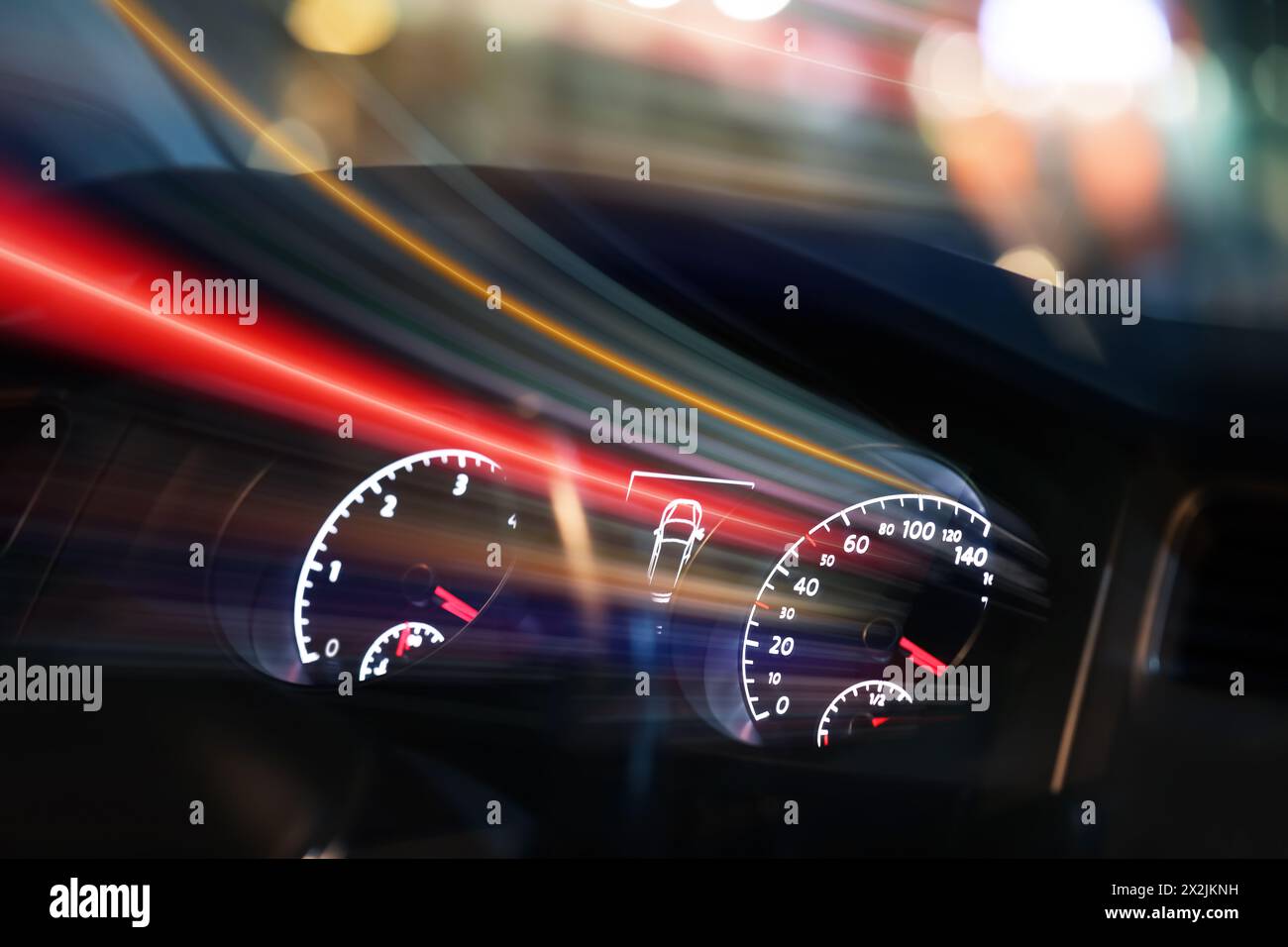 Dashboard with speedometer and tachometer in car, motion blur effect ...