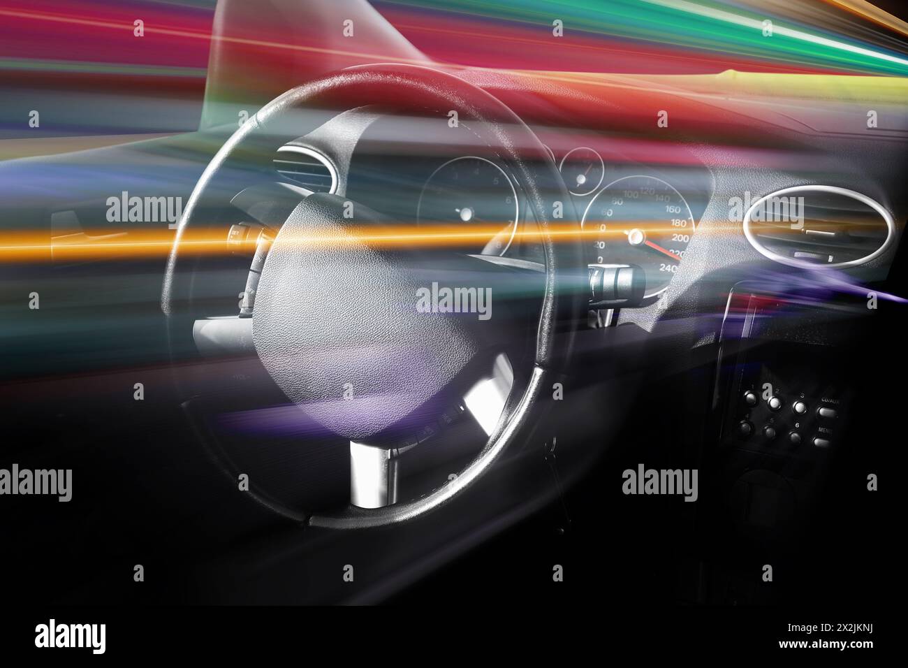 Steering wheel and dashboard in car, motion blur. Speed movement effect ...