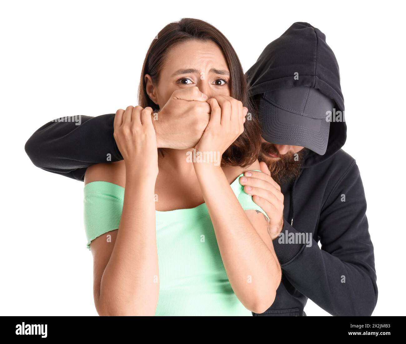 Bandit attacking scared young woman on white background Stock Photo - Alamy