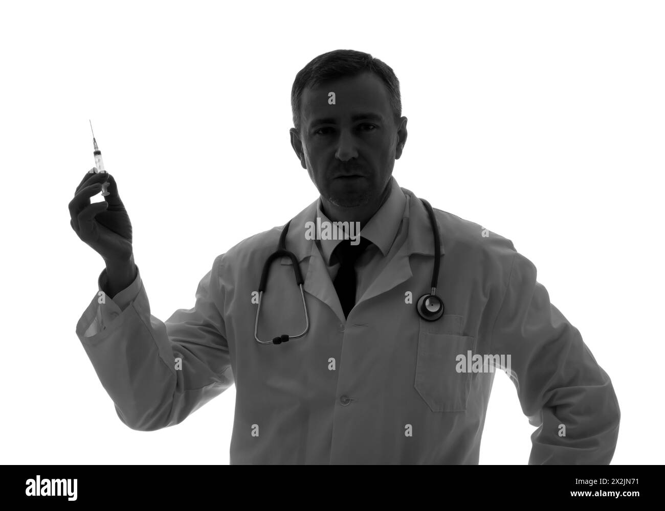 Silhouette of mature doctor with injection on white background Stock ...