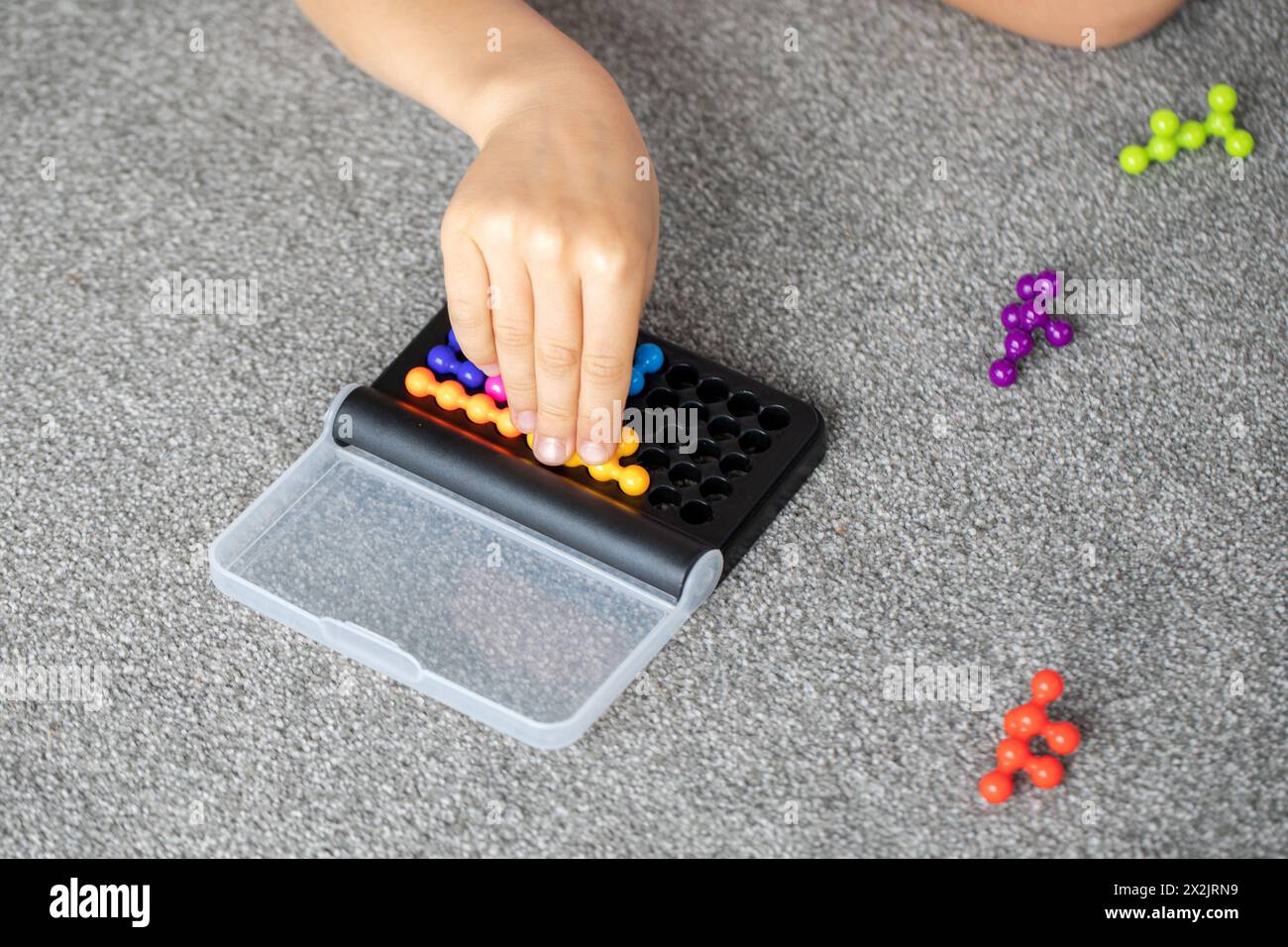 Piecing together a puzzle hi-res stock photography and images - Alamy