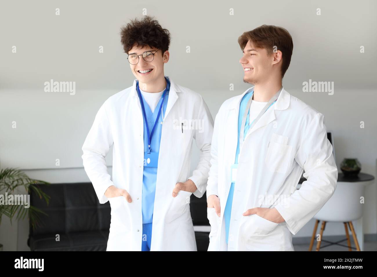 Portrait of male medical interns in clinic Stock Photo - Alamy