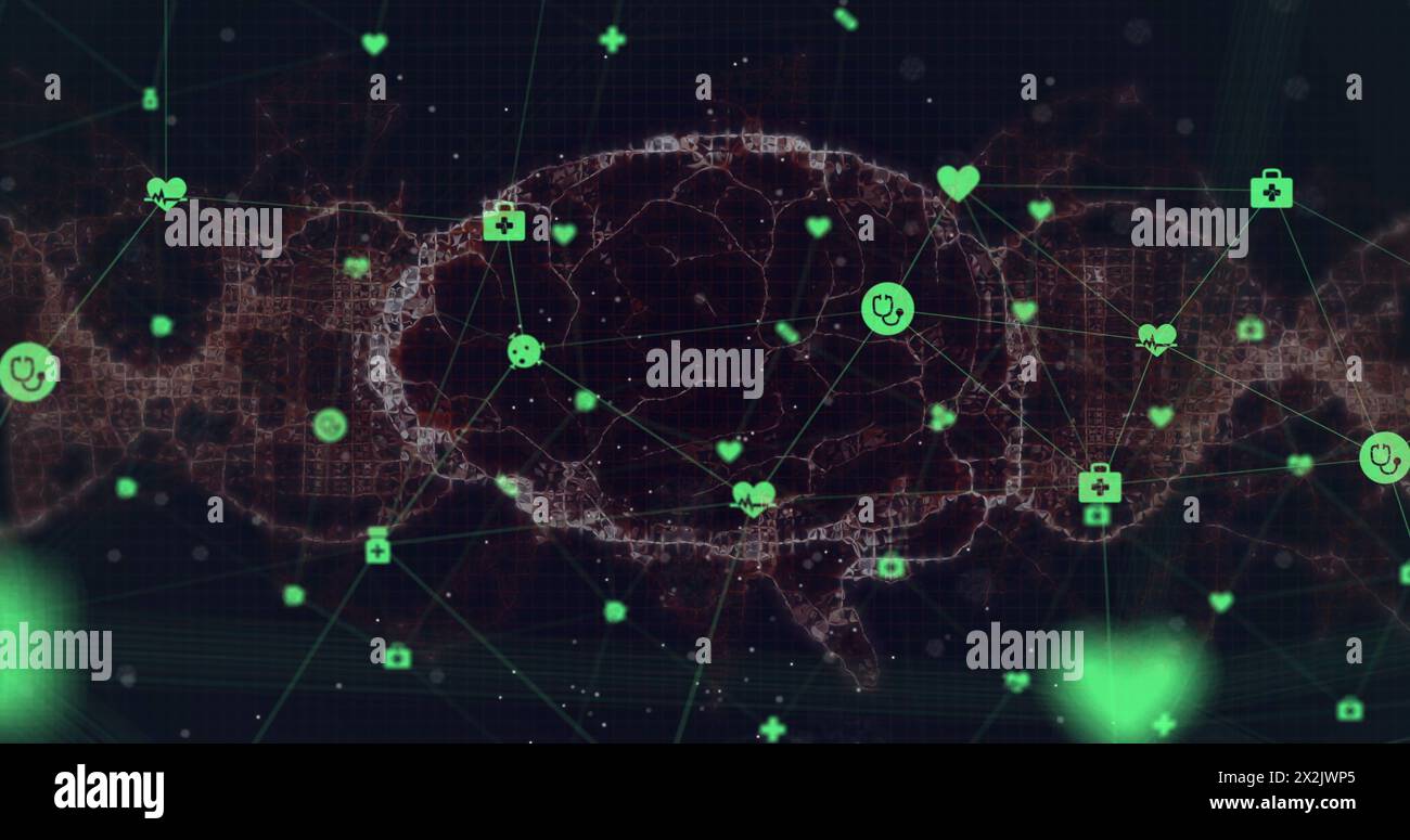 Digital image of network of medical icons against human brain spinning ...