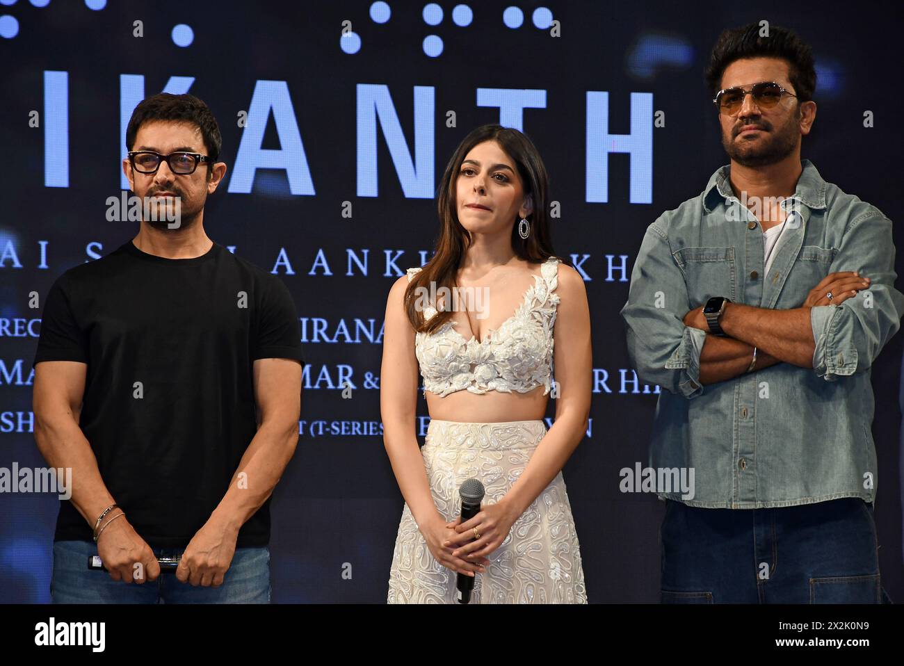 L-R Bollywood actor and filmmaker Aamir Khan, actress Alaya F (C) and ...