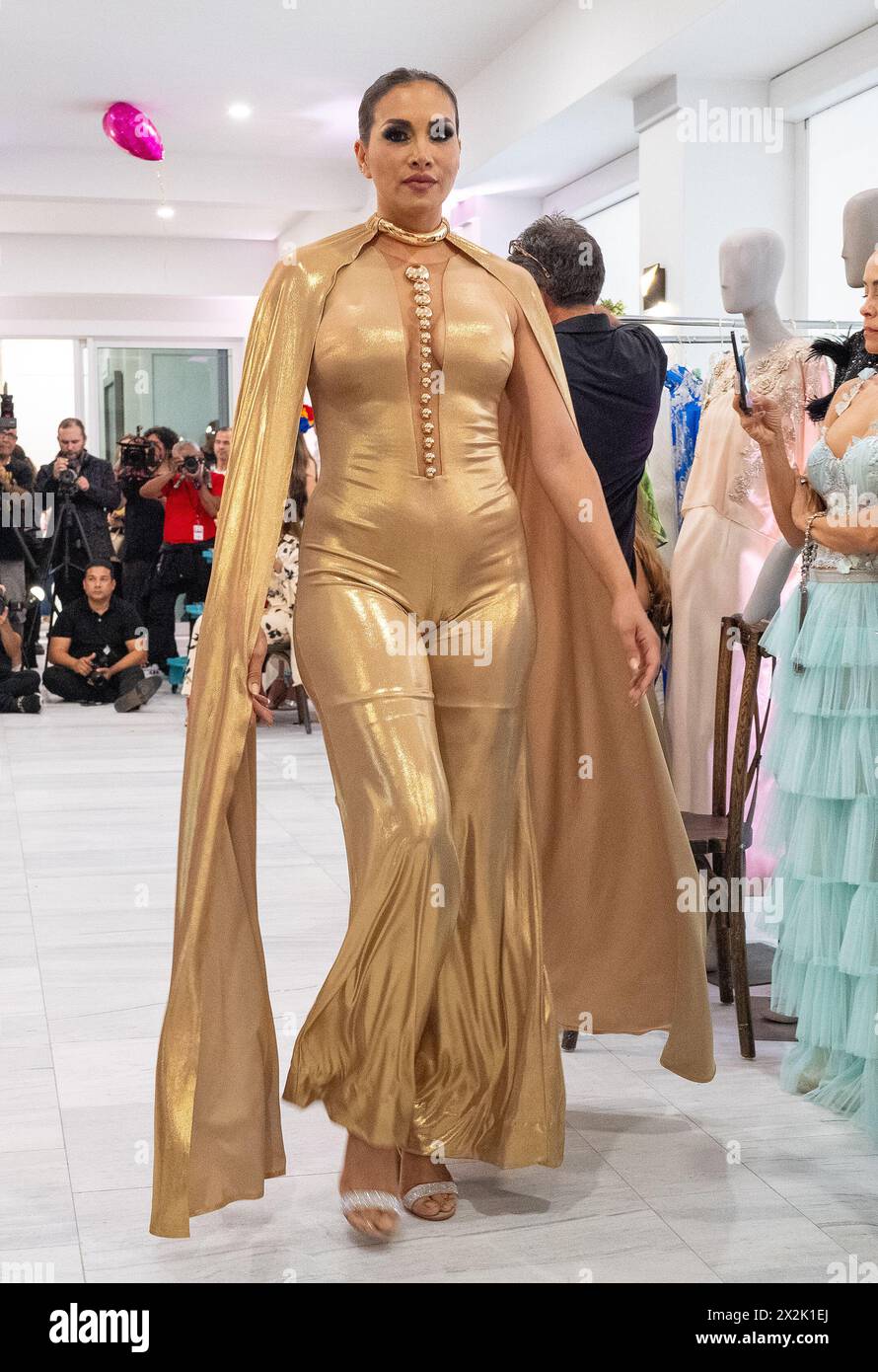 CORAL GABLES, FL-APRIL 22: A model walks during the “Moda Como Proposito” fashion show on April ...