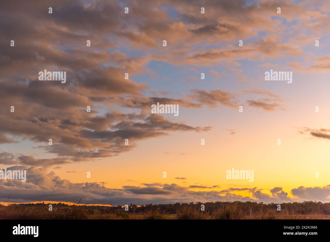 Dramatic cloudy afternoon sunset sky clouds. Seen in Queensland ...