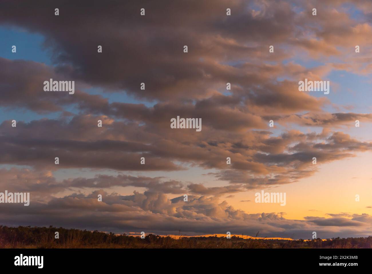 Dramatic cloudy afternoon sunset sky clouds. Seen in Queensland ...