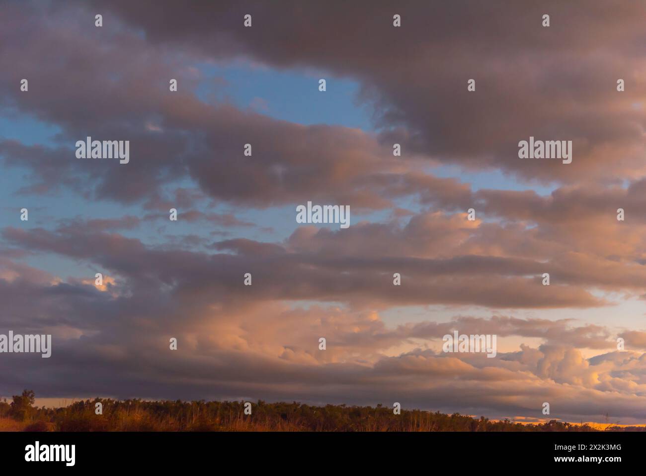 Dramatic cloudy afternoon sunset sky clouds. Seen in Queensland ...