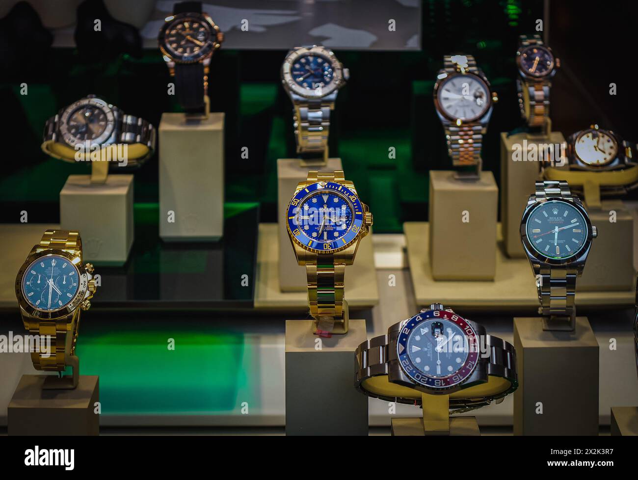 A sophisticated display of various luxury watches in a retail store ...