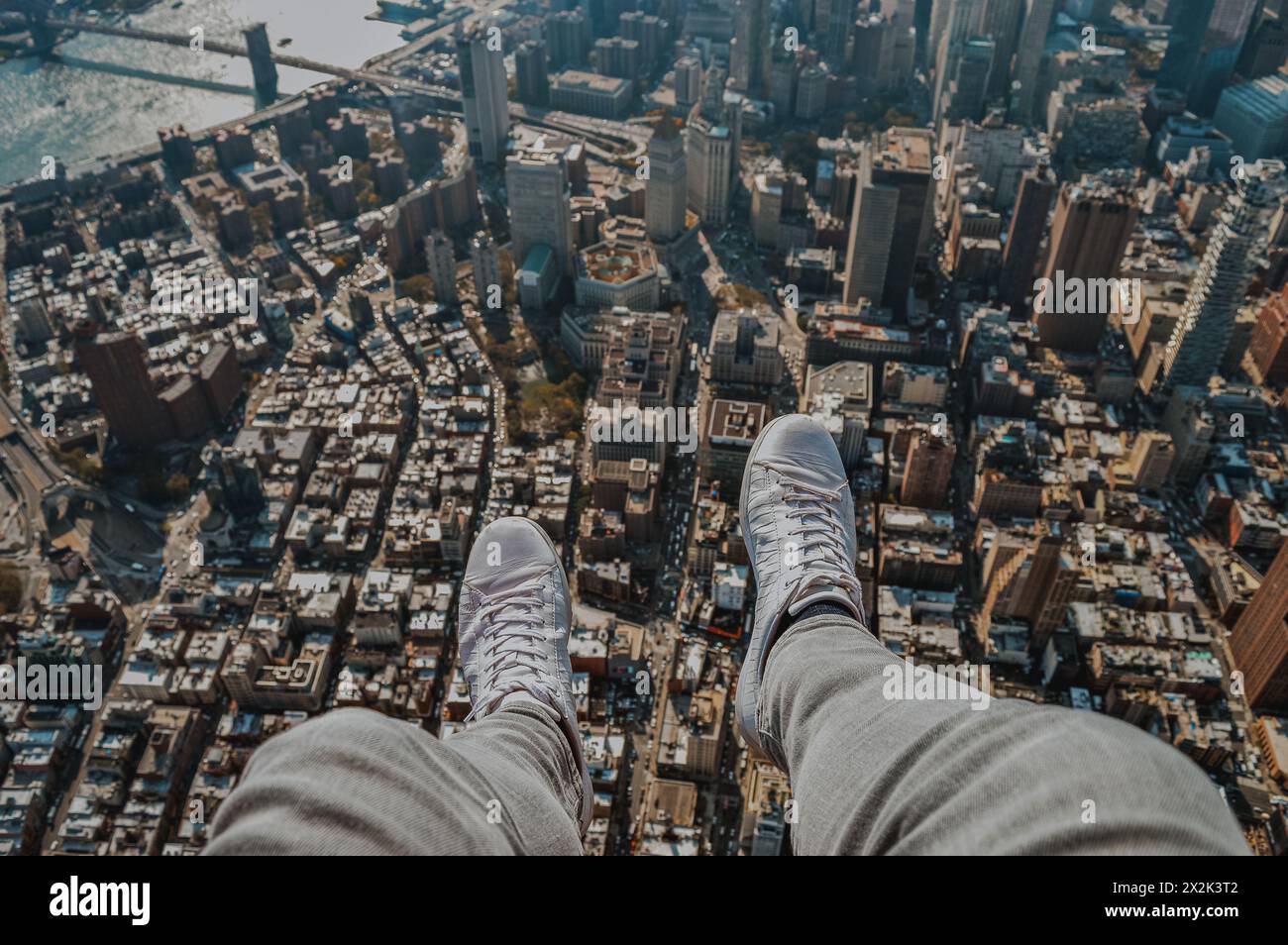 Legs dangling new york city hi-res stock photography and images - Alamy
