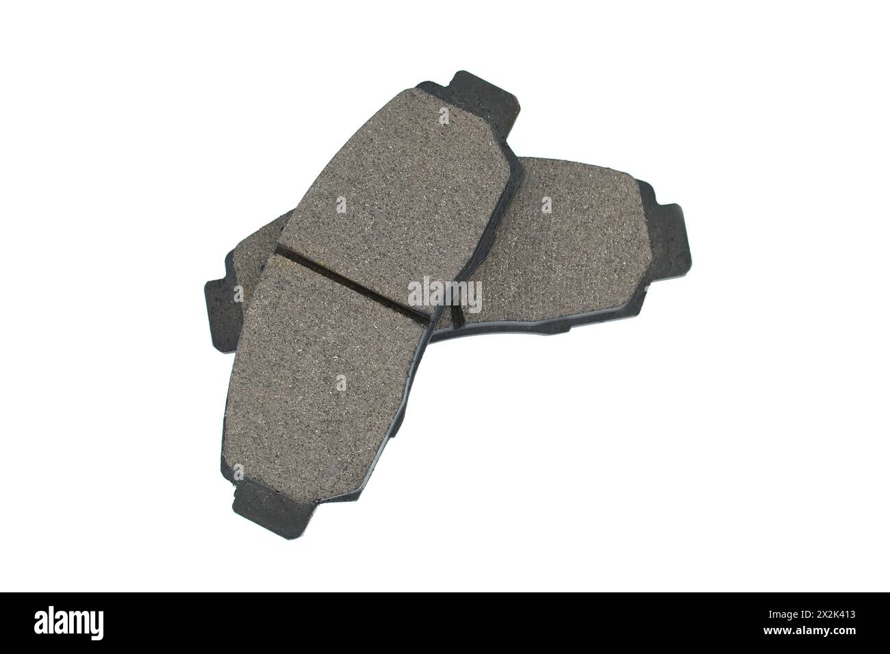 New disc brake pads isolated on white background, maintenance of the ...