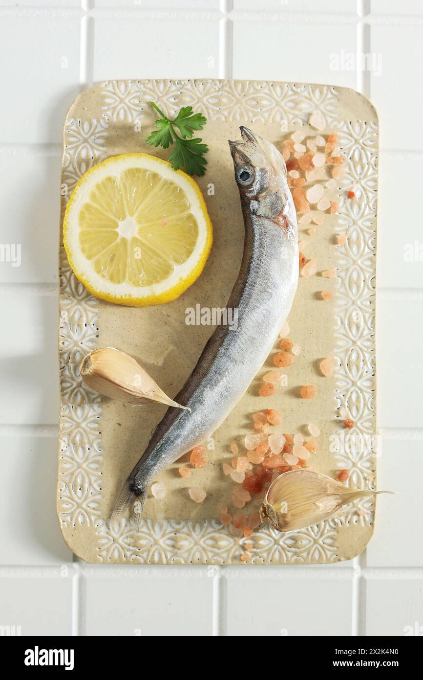 Frozen Capelin Shisamo Fish on Ceramic Plate, Top View. Ikan Cipung ...