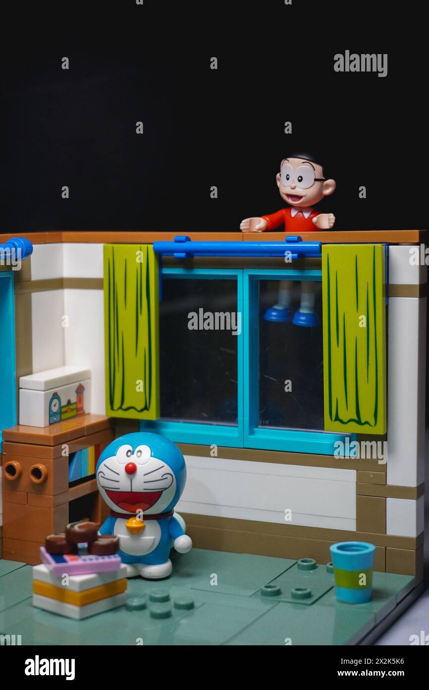 The figure of Nobita peeking at Doraemon from outside the window Stock ...