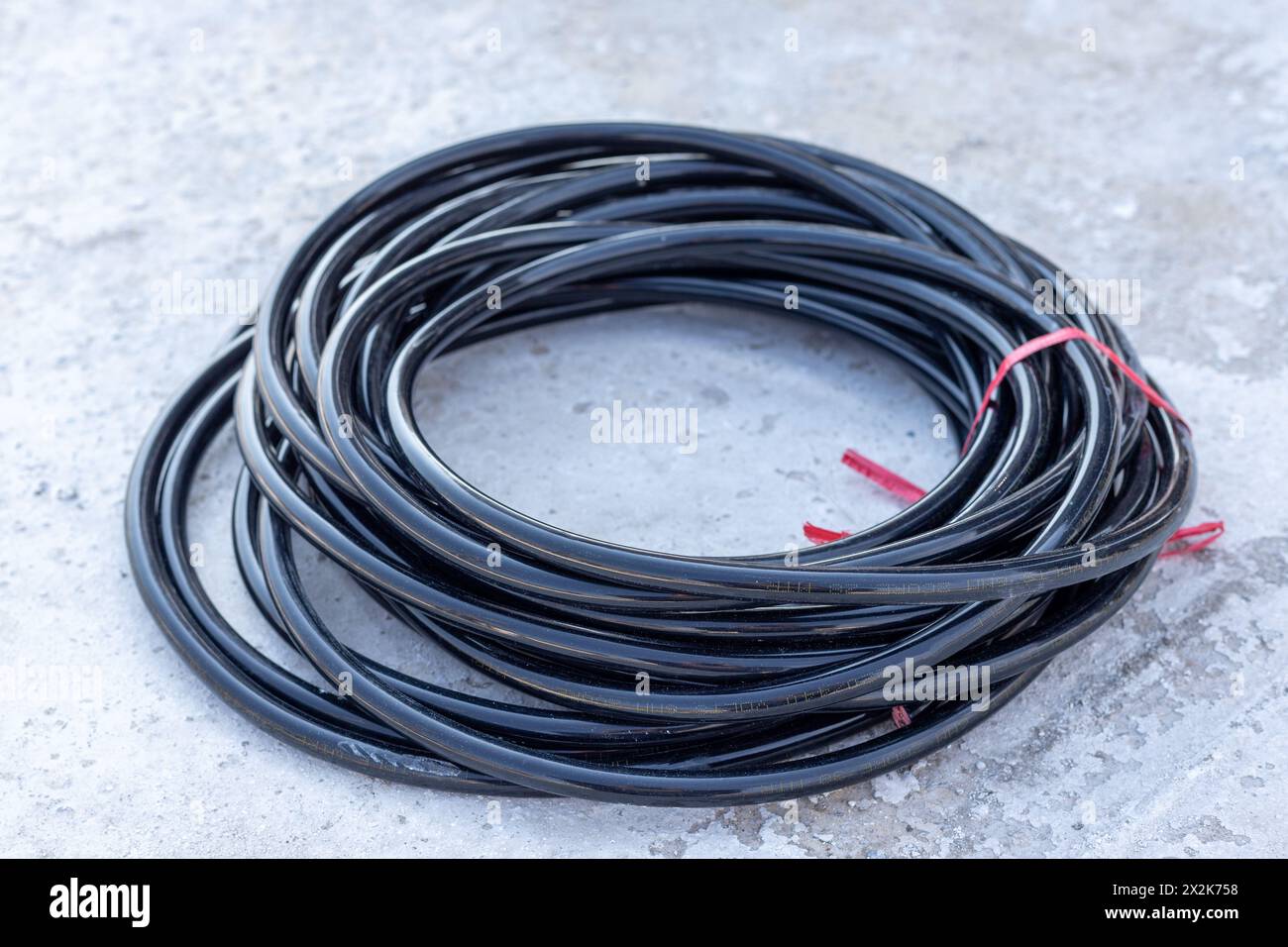 Wire bundle on concrete background. Selective focus Stock Photo - Alamy