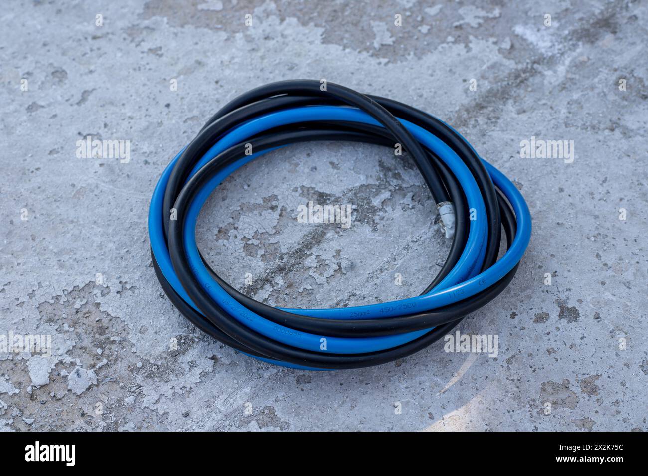 Black and blue electrical wire bundle closeup Stock Photo - Alamy