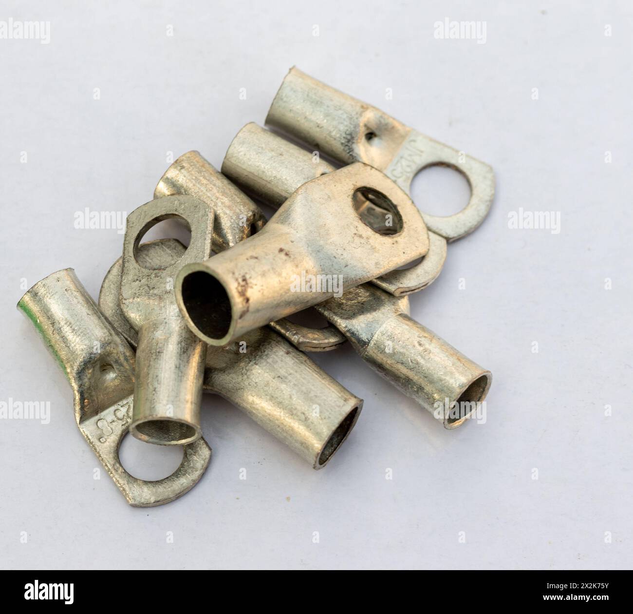 Cable terminal brass several pieces on white isolated background Stock ...