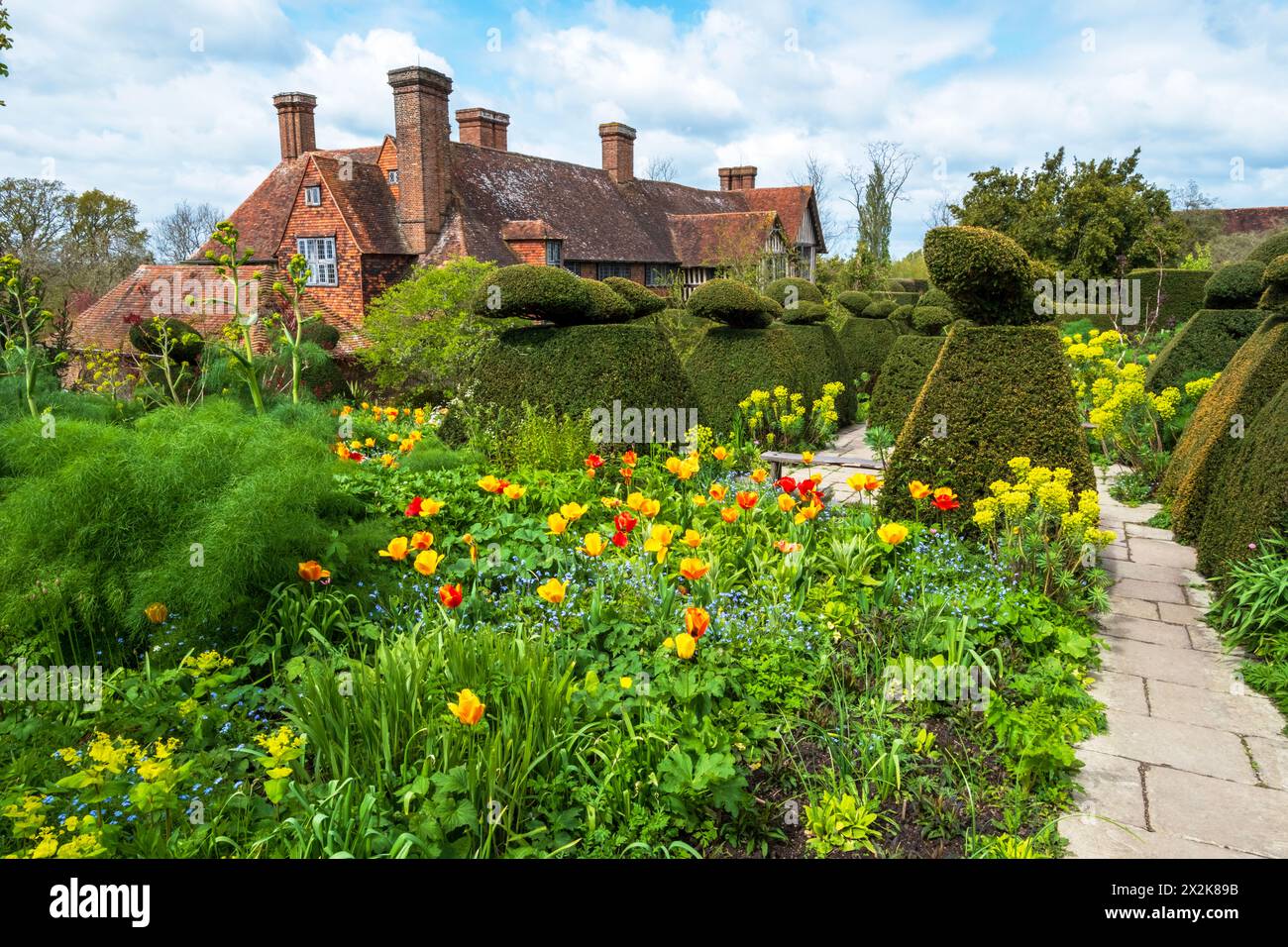 Great Dixter house and gardens in spring, East Sussex, UK Stock Photo ...