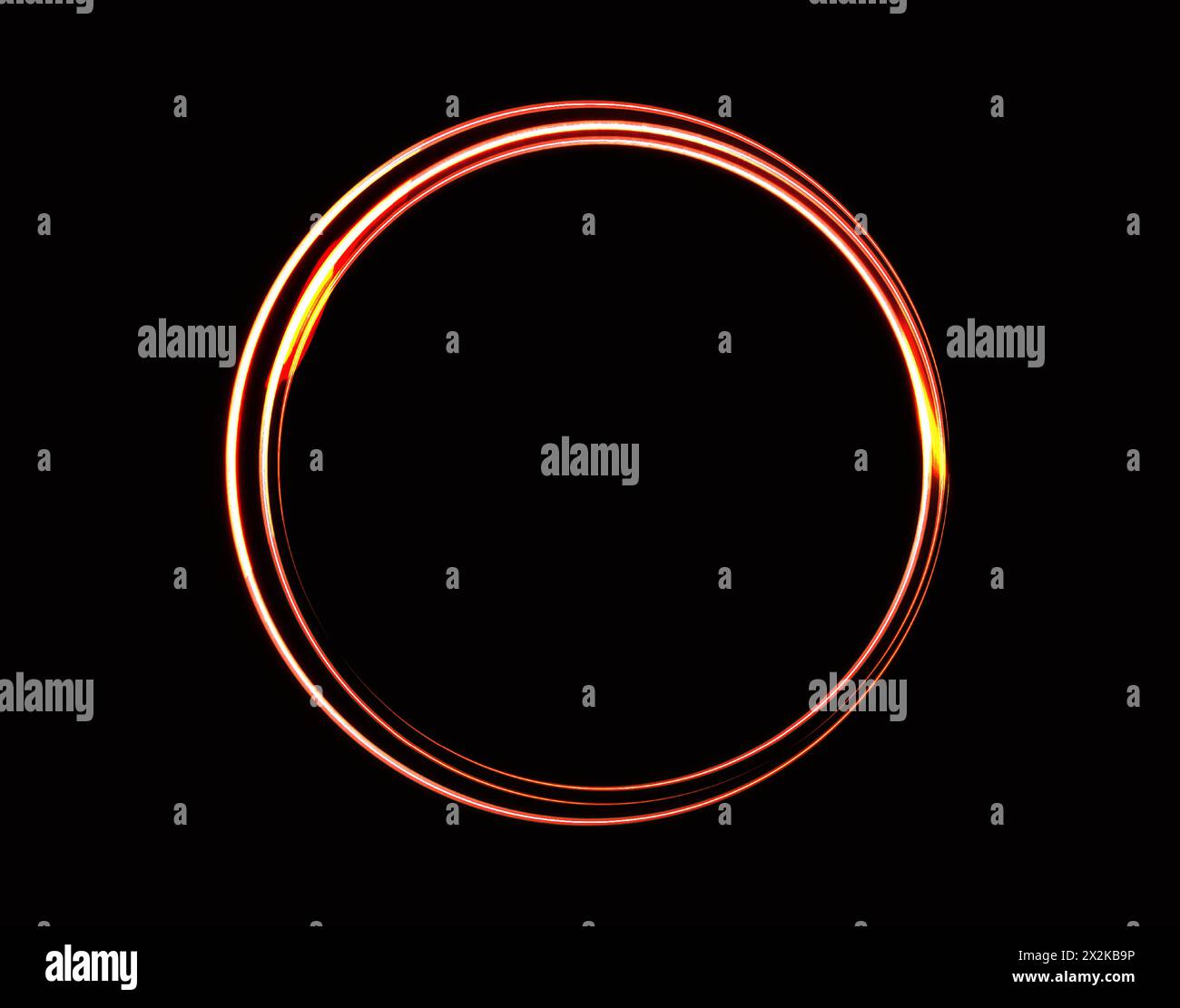 Yellow-red laser glowing circle isolated on a black background. Neon ...