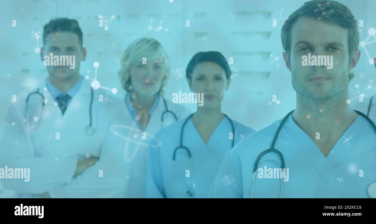 Image of networks of connections moving over team portrait of male and ...