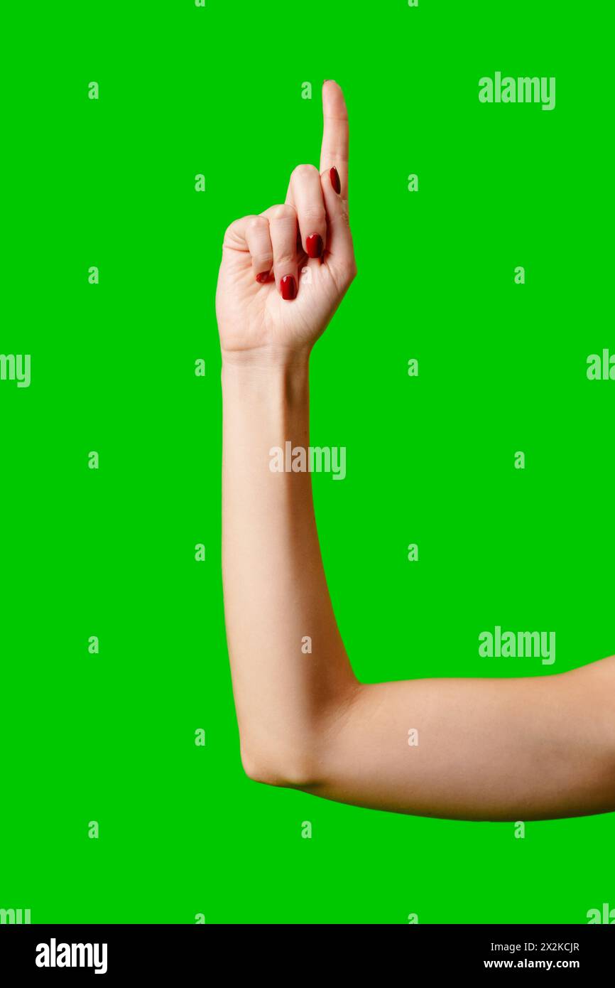 Womans Arm Hand Sign Raised in the Air Stock Photo - Alamy
