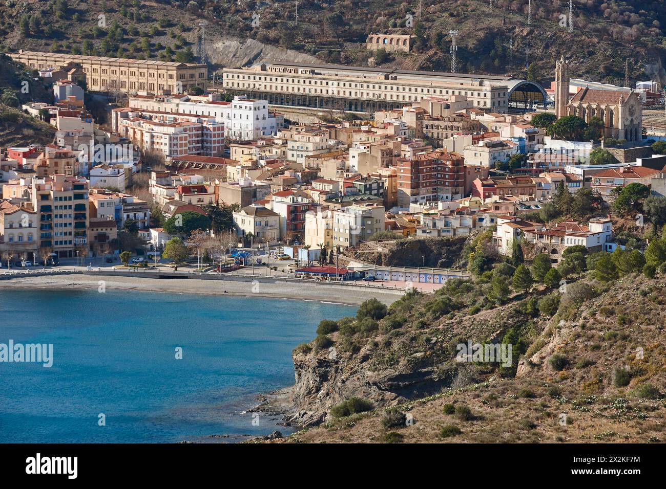 Mediterranean town of Portbou. Beach and railway station. Girona, Spain ...