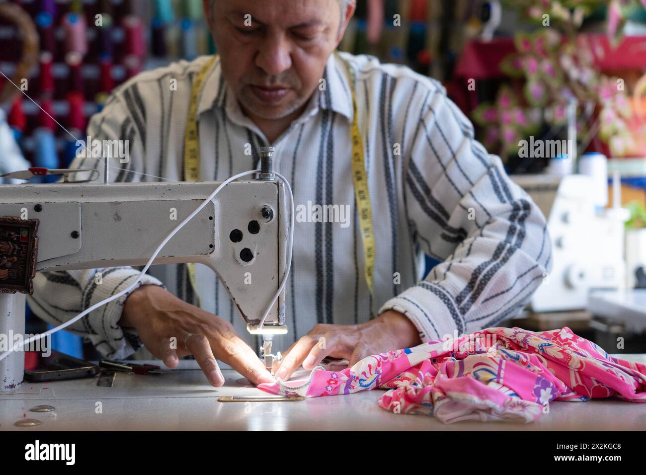 Man sewing hi-res stock photography and images - Alamy