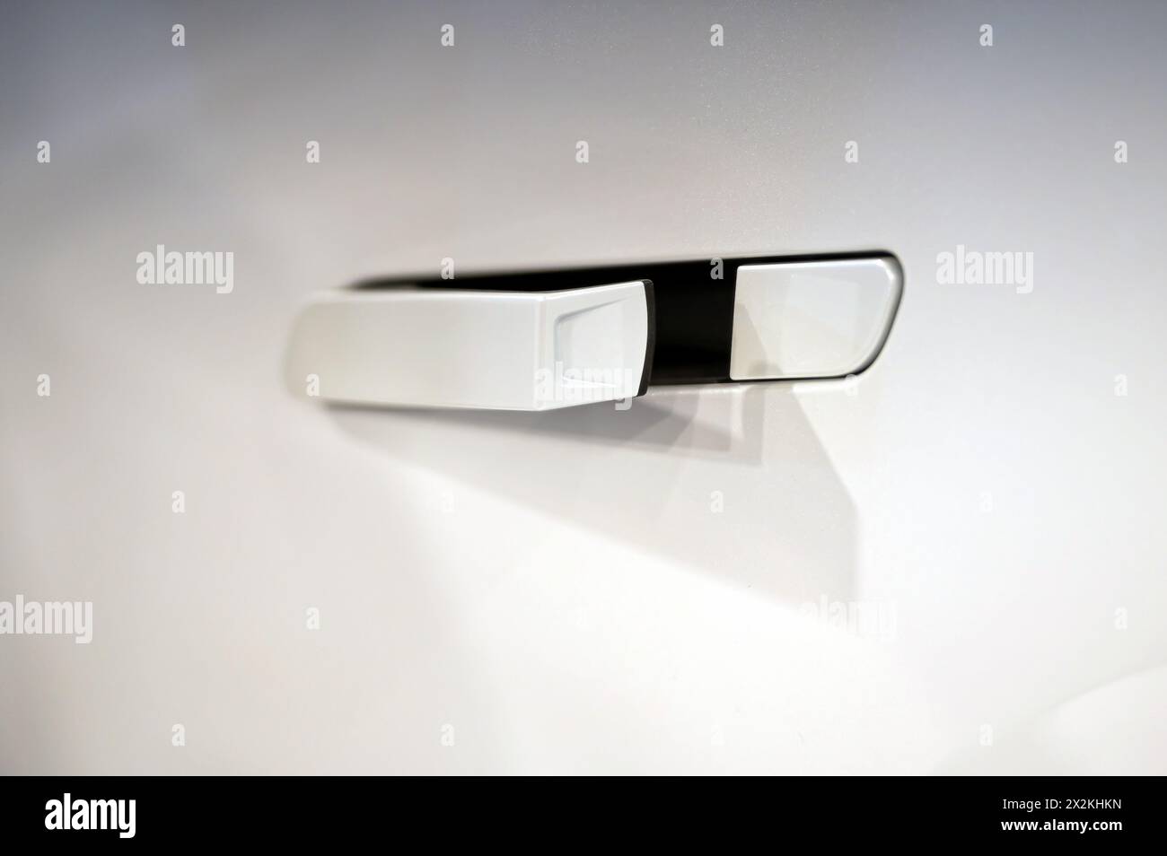 smart retractable door handles of white electric car, close-up Stock ...