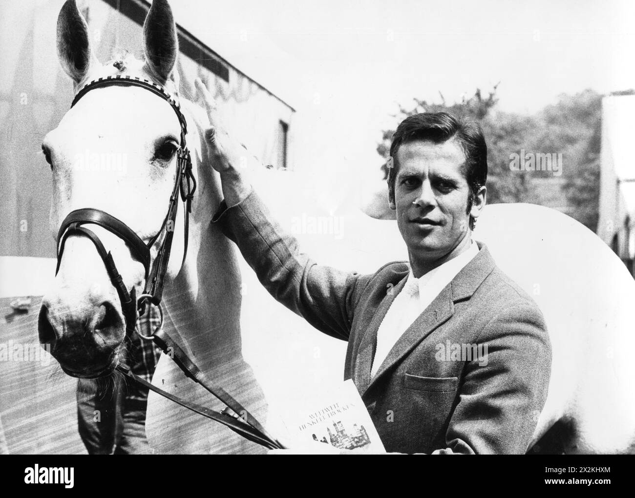 Man riding horse showjumping Black and White Stock Photos & Images - Alamy