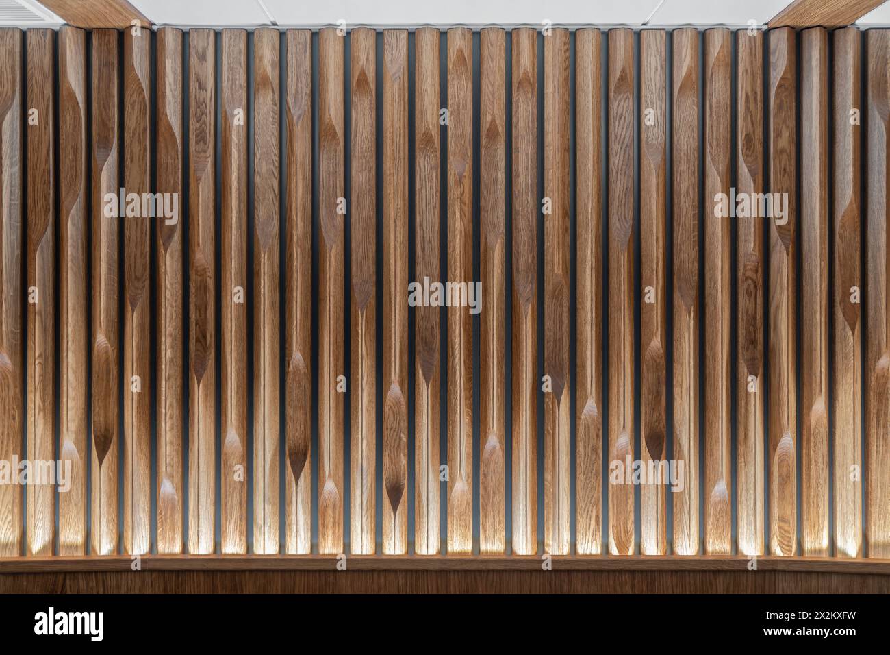 Decorative wooden panel made from solid oak of vertical grooved slats ...