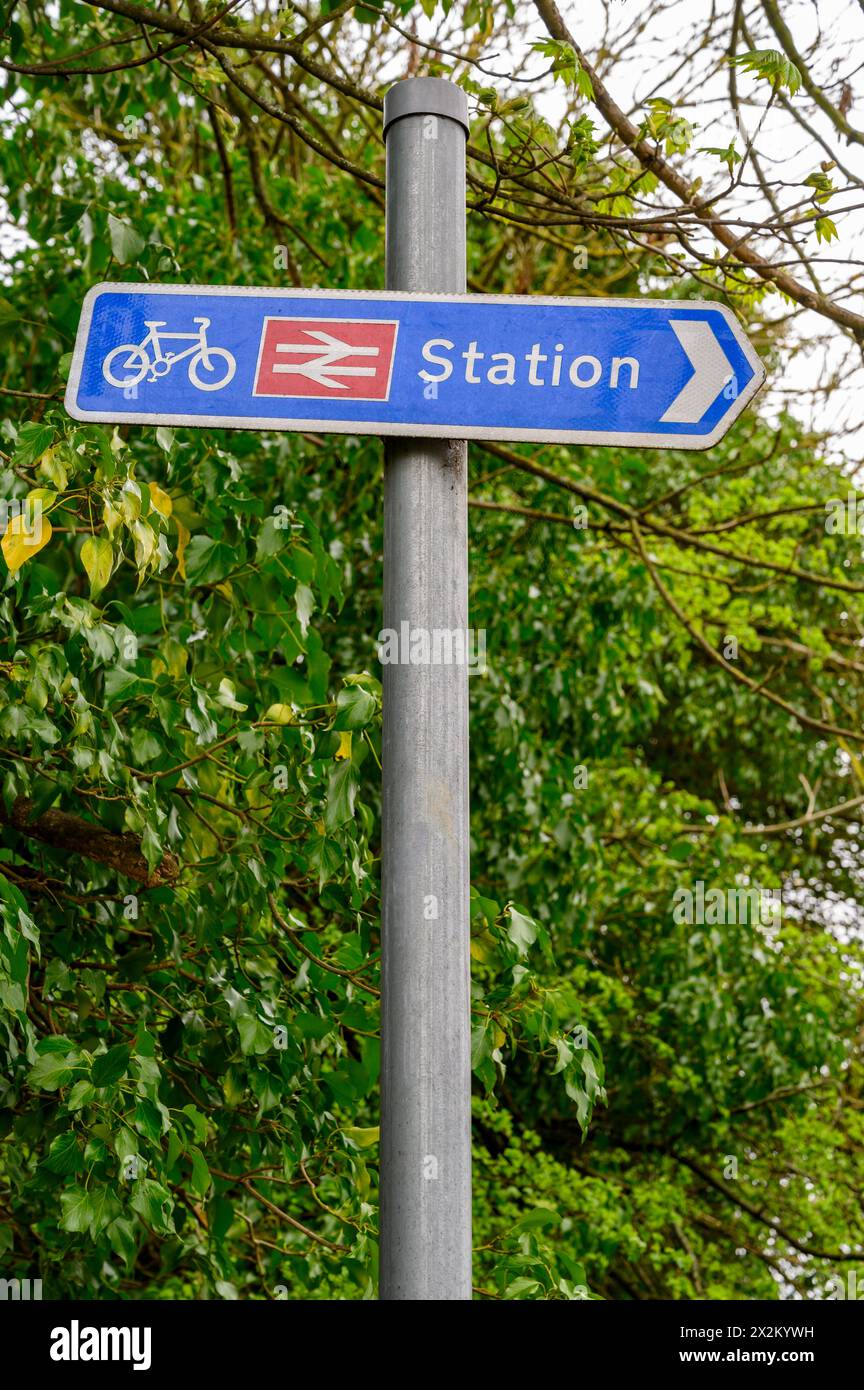 Signpost with directional sign for cyclists showing cycle path to the ...