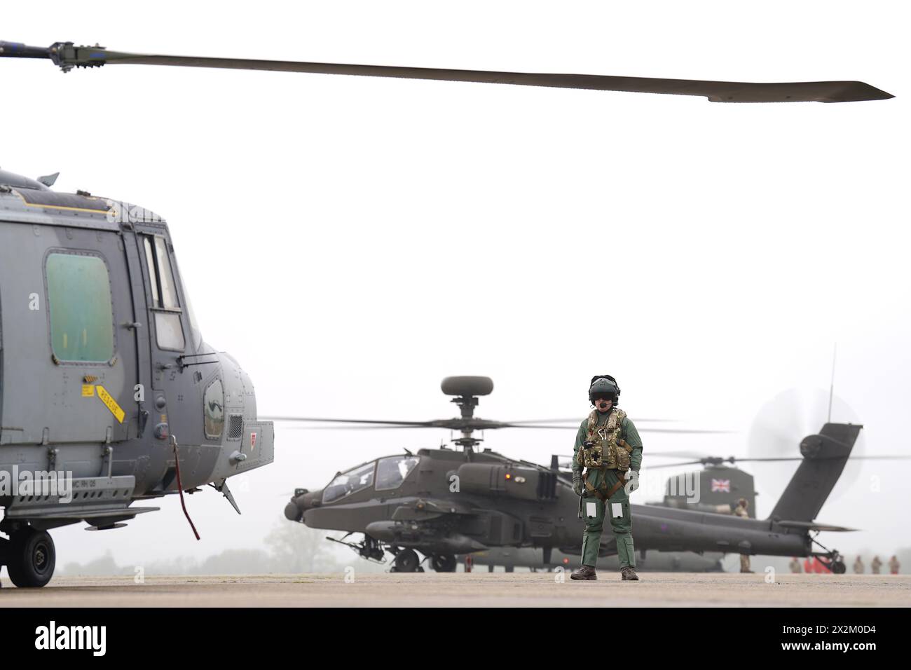 British Army Apache AH-64E attack helicopters are prepared for take off ...