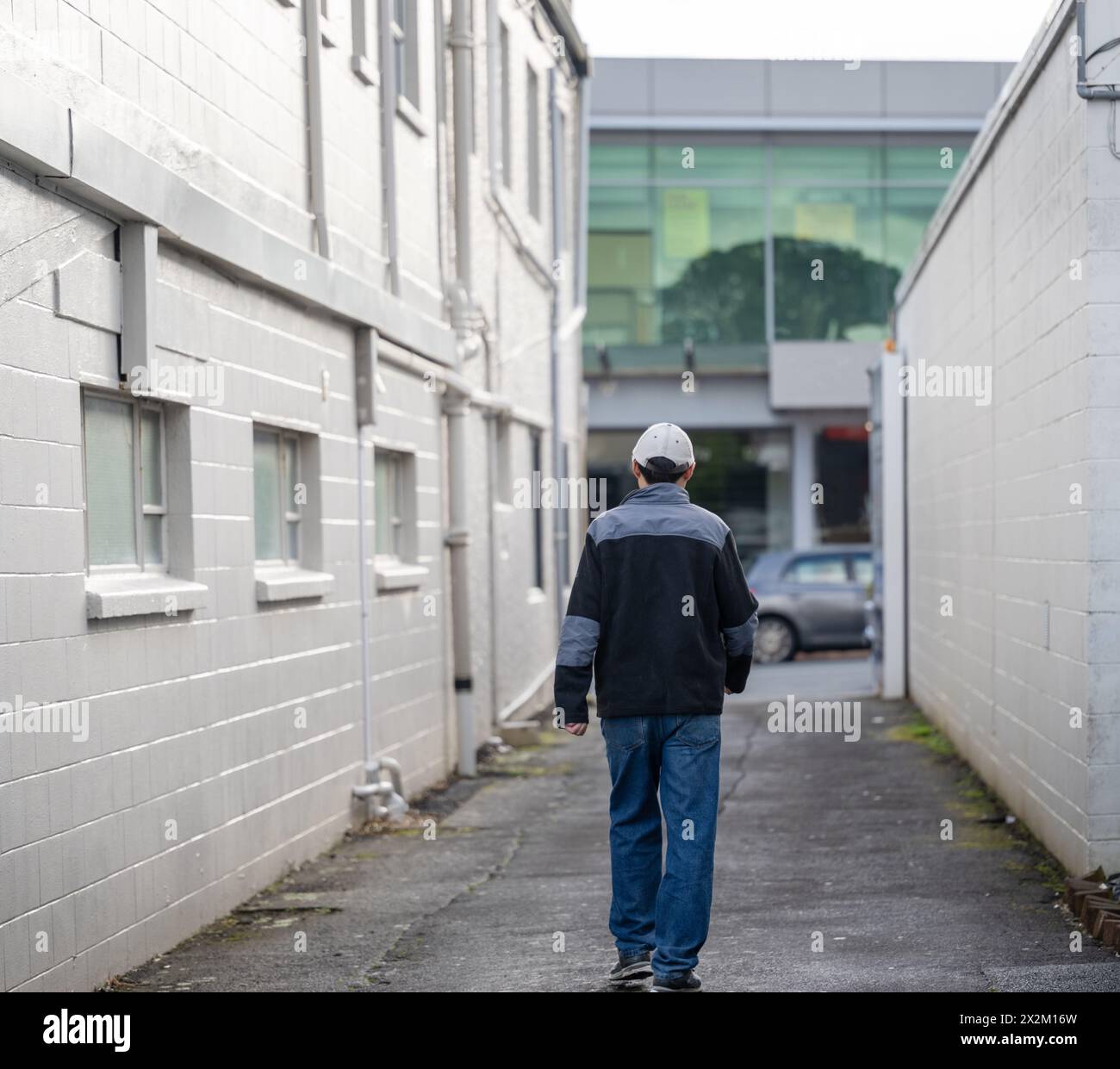 Man walking towards parked car hi-res stock photography and images - Alamy