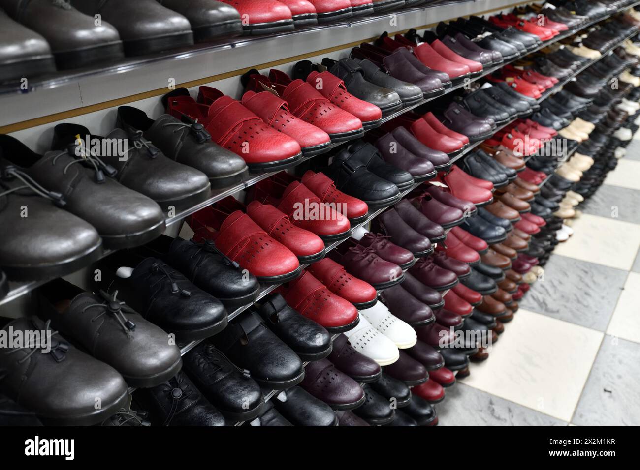 Children's Shoes on store counter Stock Photo - Alamy