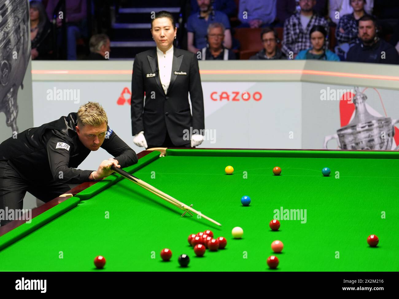 Kyren Wilson in action against Dominic Dale (not pictured) on day four ...