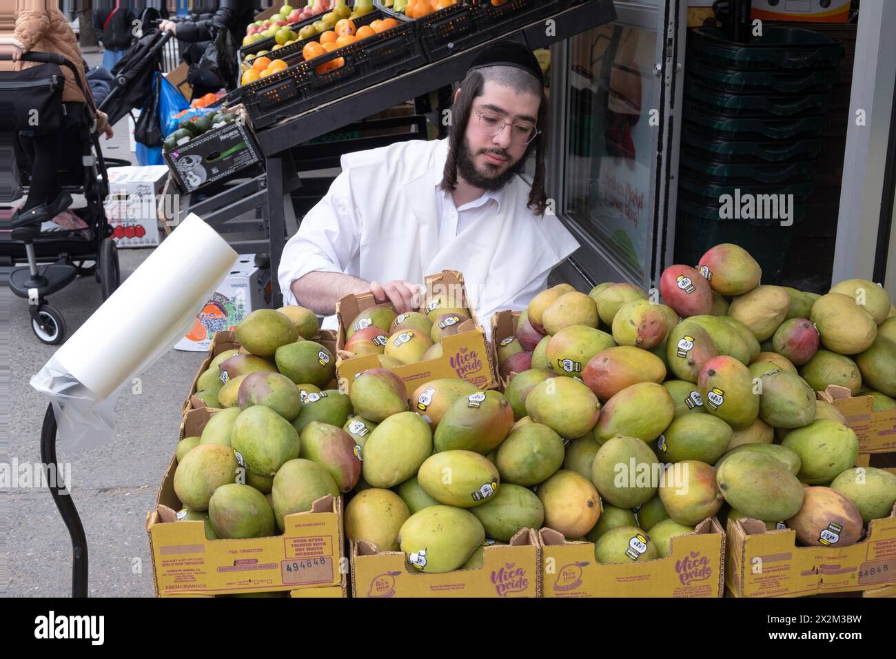 On the day before Passover, a Hasidic worker in a supermarket sets out ...