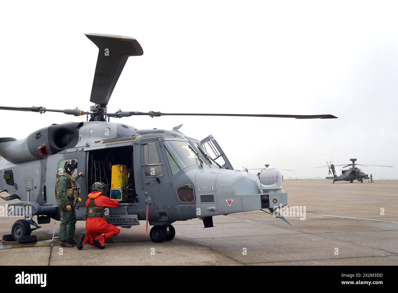 A Wildcat reconnaissance helicopter is prepared for deployment from ...