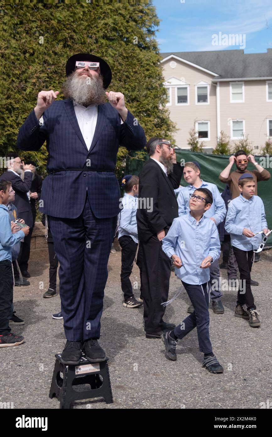 Jewish yeshiva students & their Rabbi teachers watch the 2024 solar ...