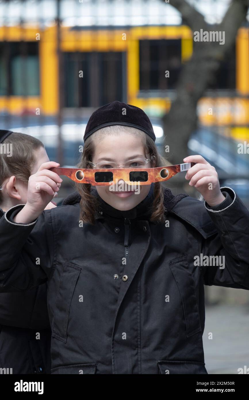 On the day before the 2024 eclipse, an orthodox Jewish boy tries on his ...