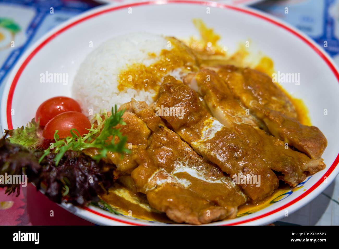 A delicious curry fried chicken chop rice in a Hong Kong tea restaurant ...
