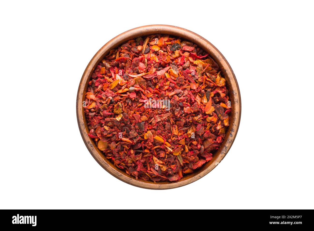 dried tomato powder seasoning in a wooden bowl, top view. spice ...