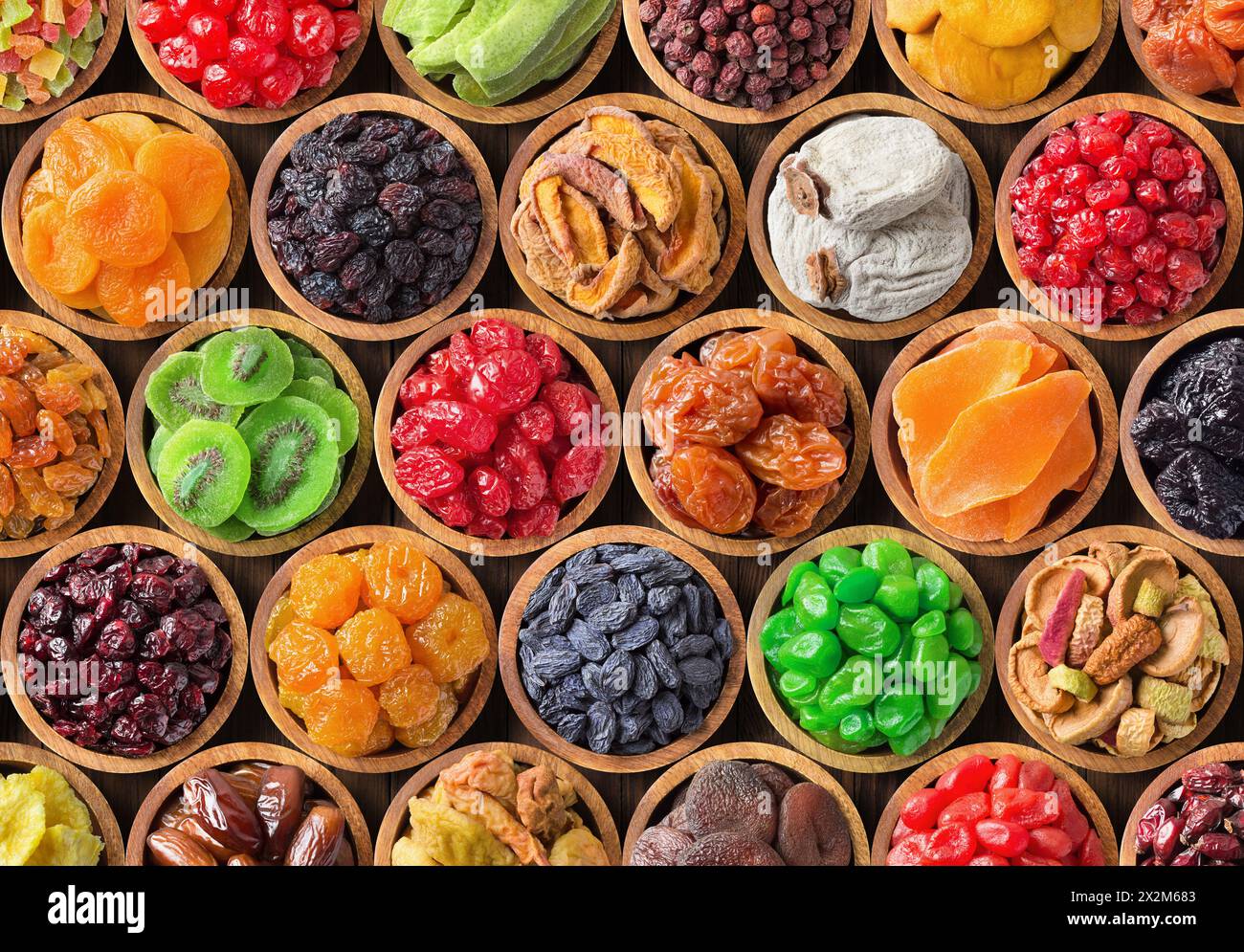 mix dried fruits and berries background, top view Stock Photo - Alamy