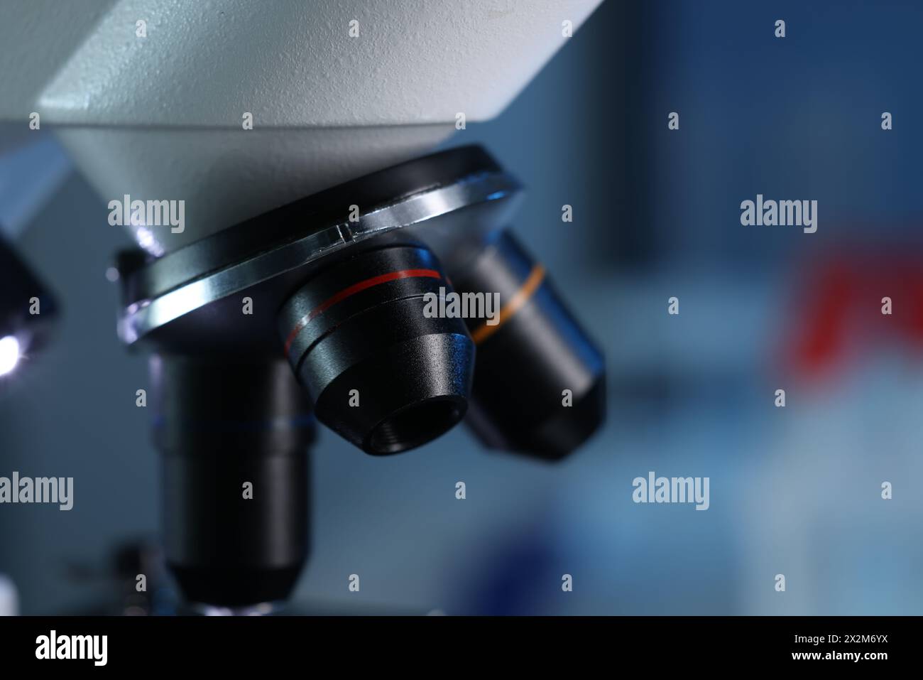 One microscope on blurred background, closeup view Stock Photo - Alamy