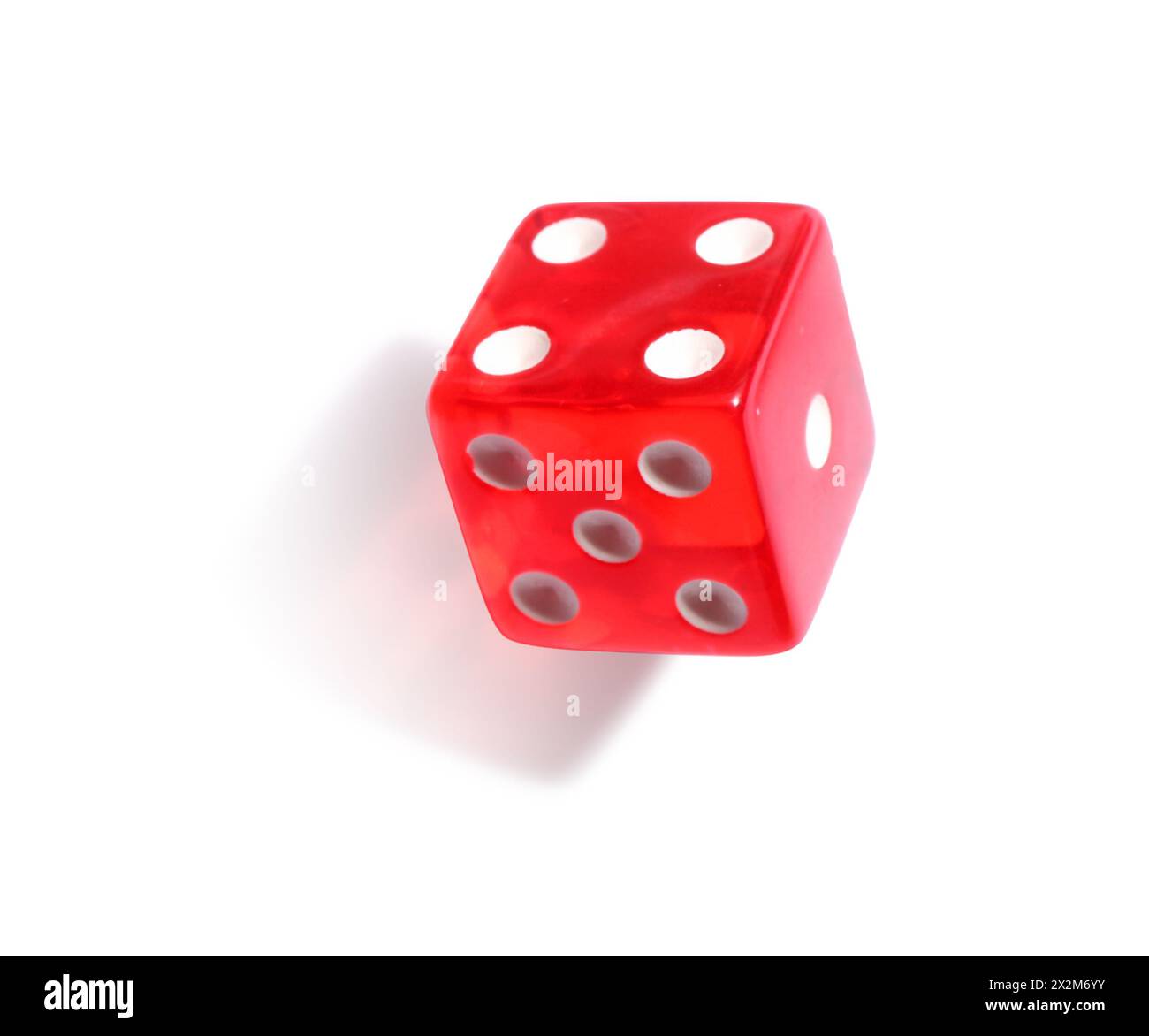 One red game dice isolated on white Stock Photo - Alamy